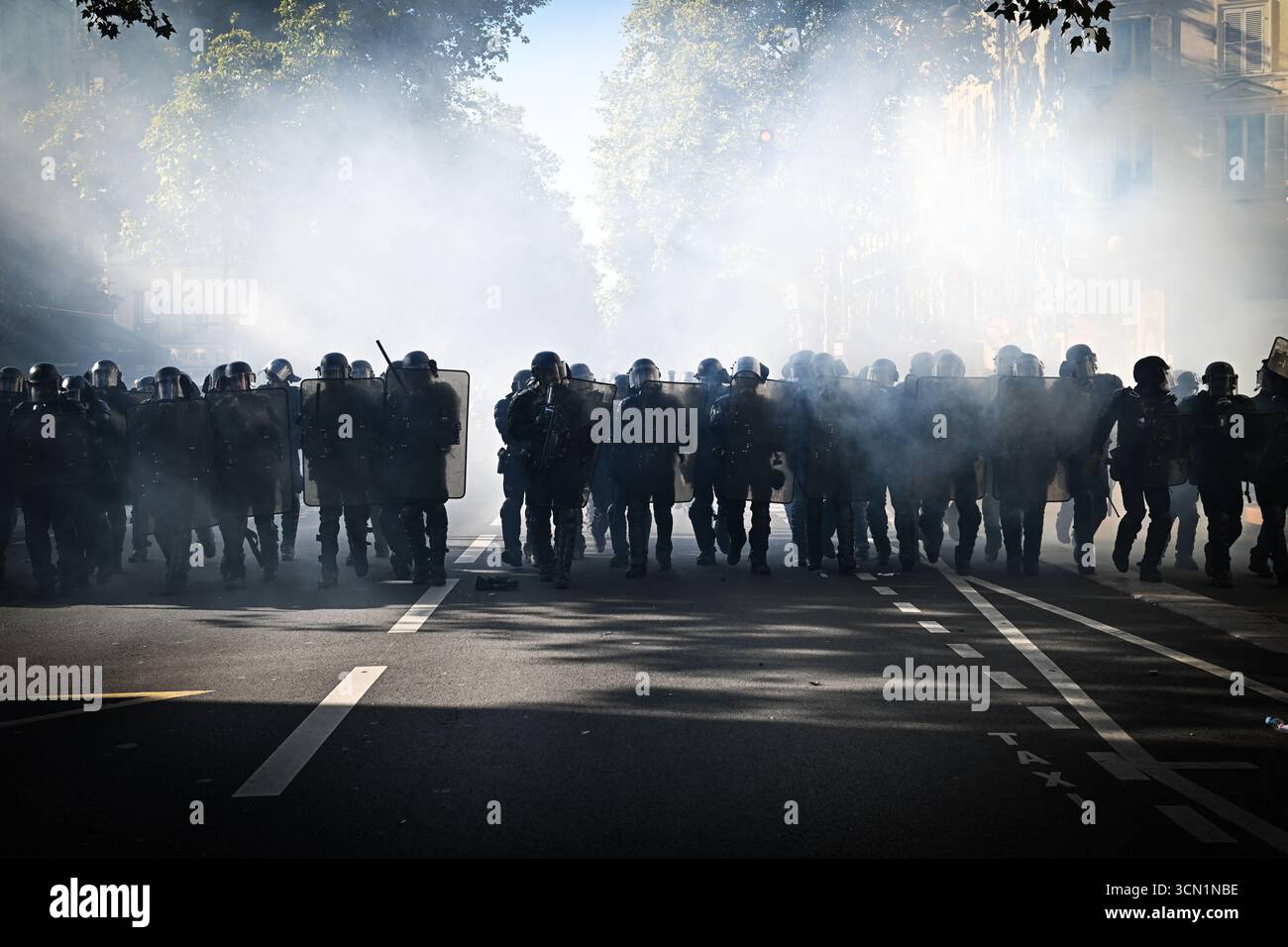 Clashes occur between French riot police and protesters during a ...