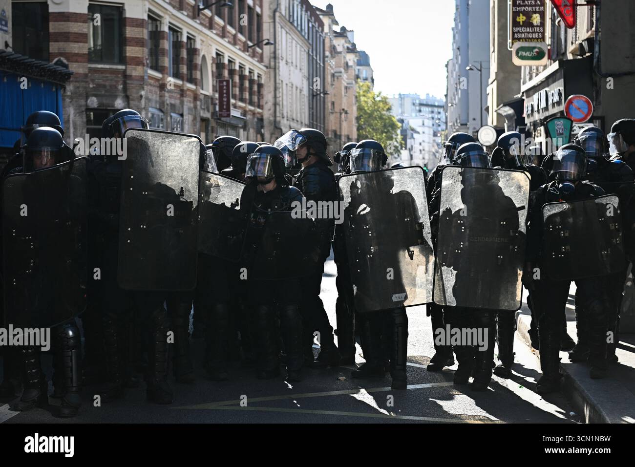 Clashes occur between French riot police and protesters during a ...