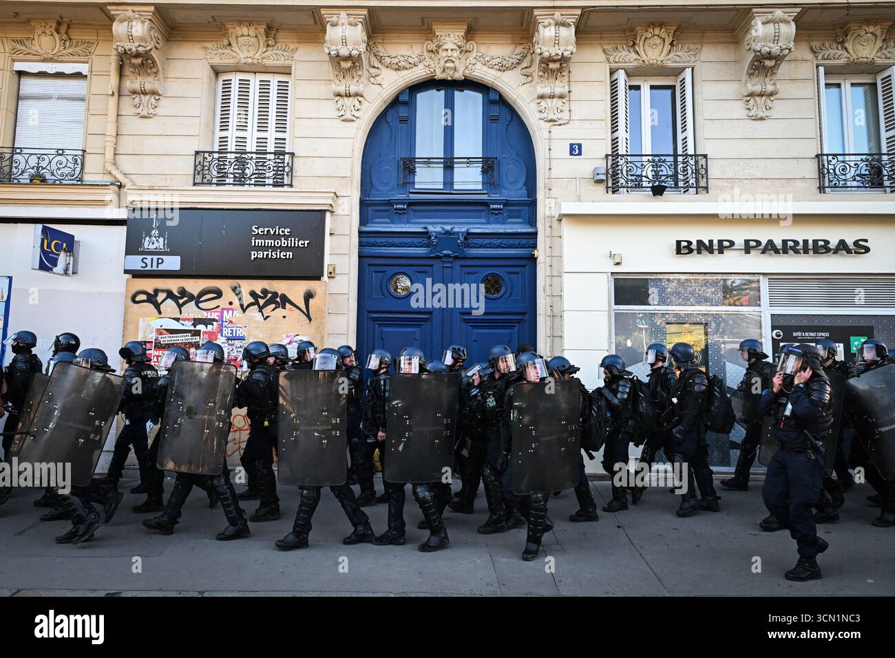 Clashes occur between French riot police and protesters during a ...