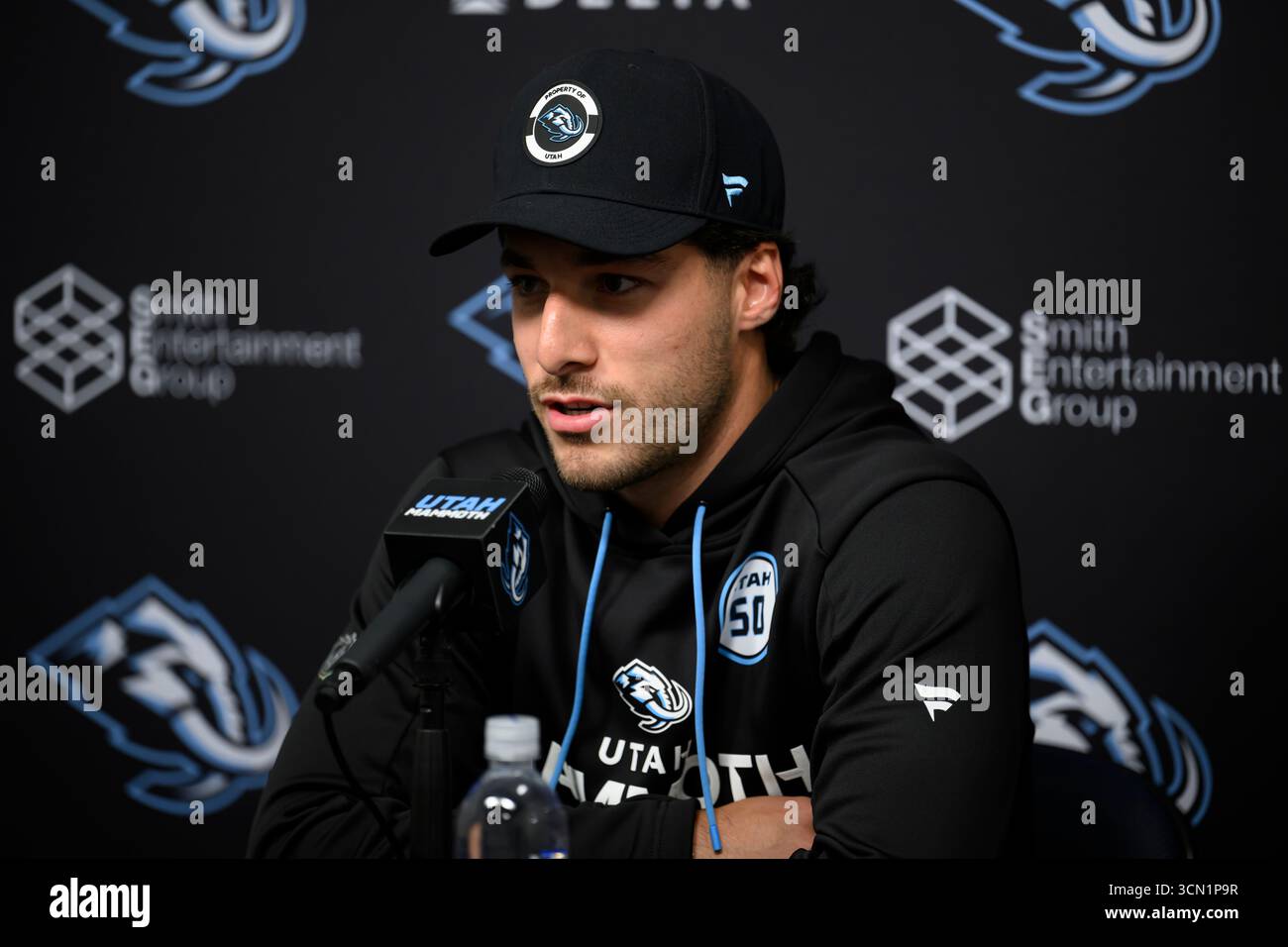Utah Mammoth defenseman Sean Durzi speaks during media day ahead of the ...