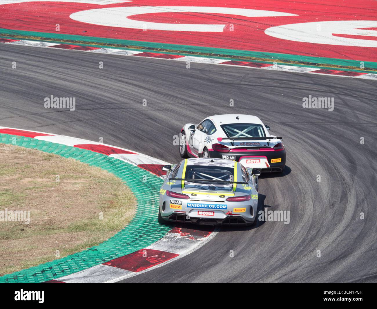 Pursuit racing cars on asphalt hi-res stock photography and images - Alamy