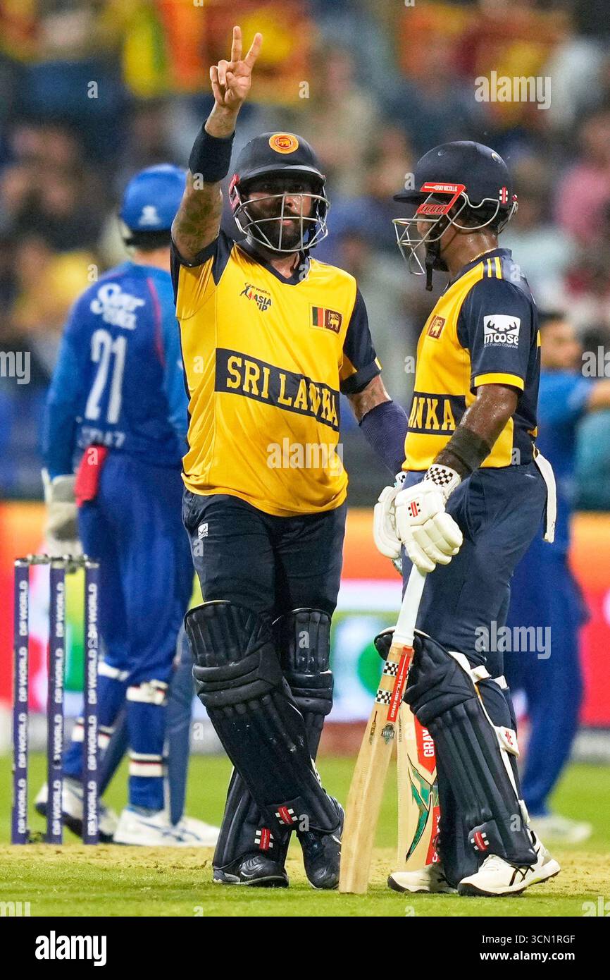 Sri Lanka's Kusal Mendis, left, celebrates his fifty runs during the ...