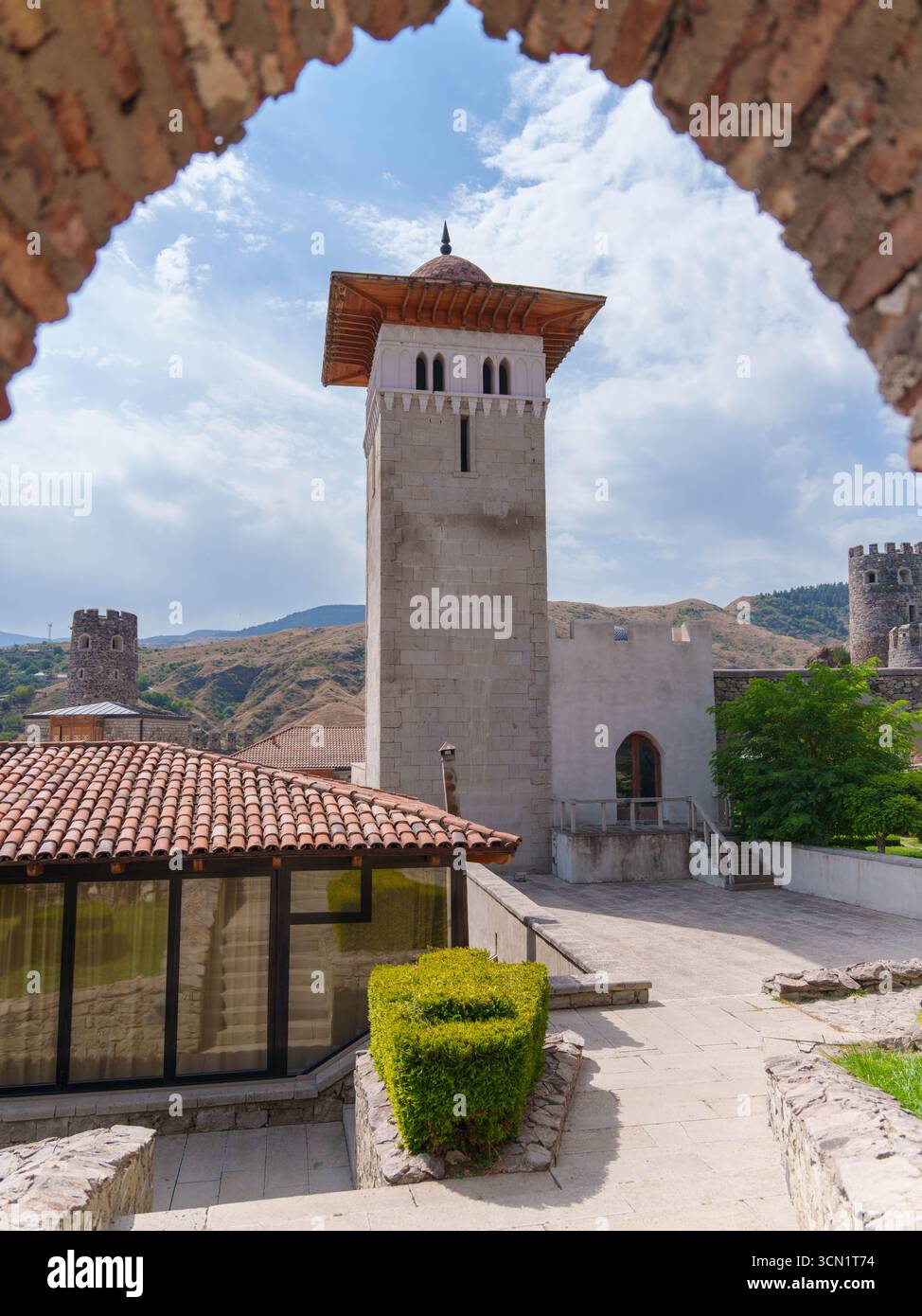 Historic Stone Tower with Wooden Roof and Arched Windows Stock Photo ...
