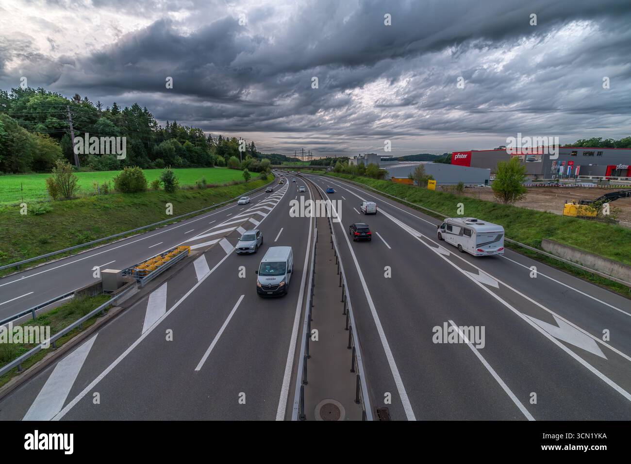 Highway with cars stop shops buildings in Affoltern am Albis ...