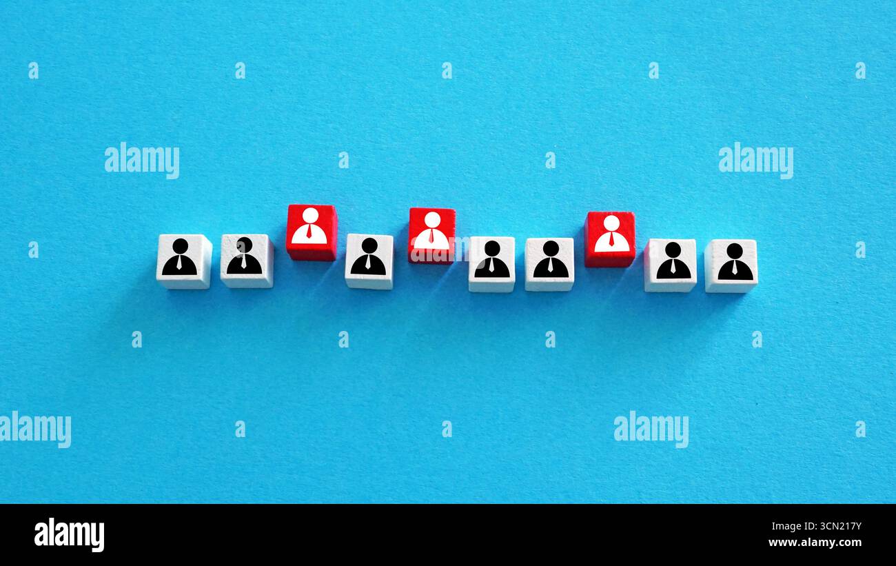 Employee figures with some highlighted in red. Staff selection Stock ...