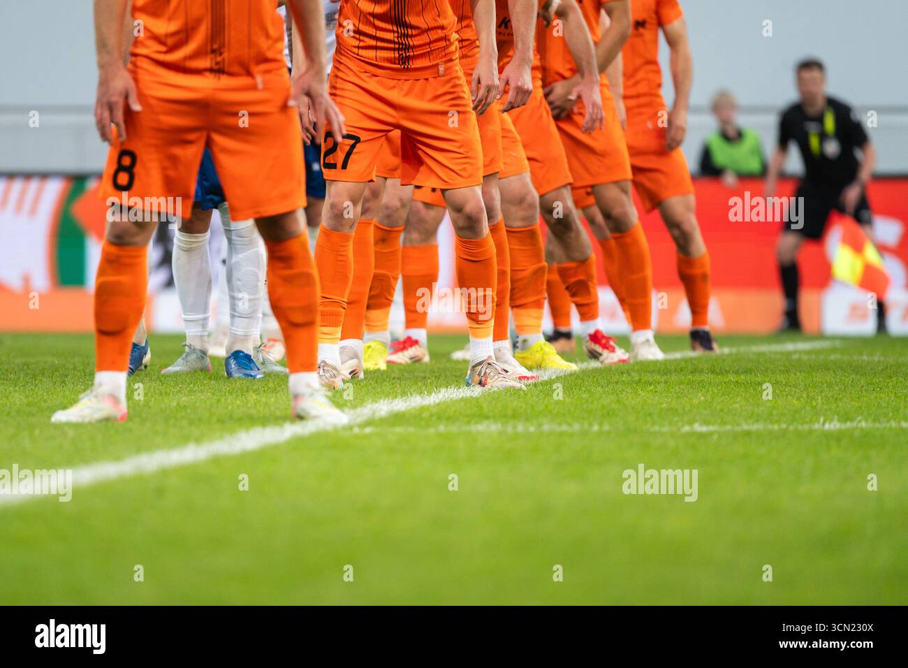 Football player's legs during set piece Stock Photo - Alamy