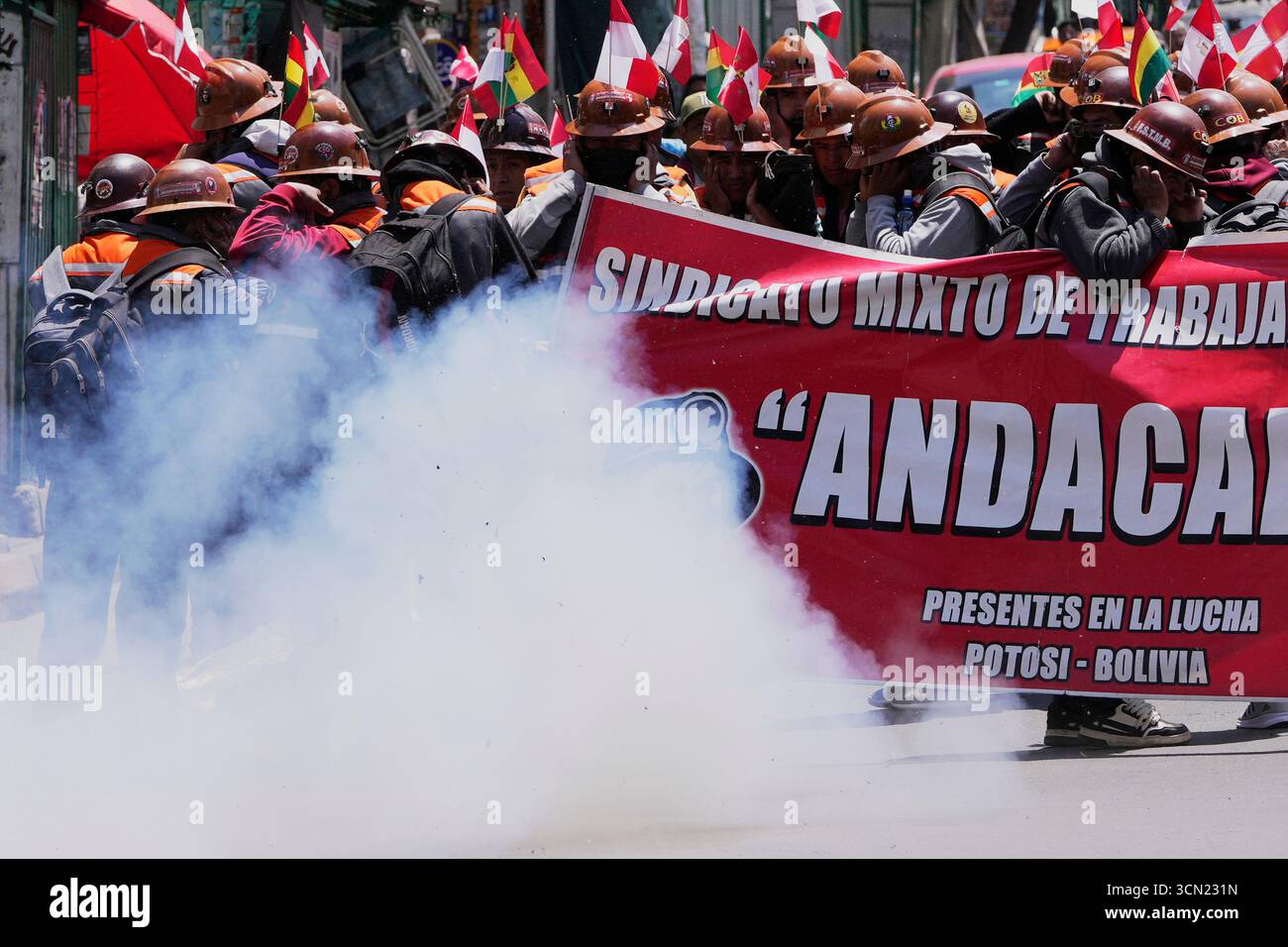 State miners detonate dynamite during a march against illegal mining ...