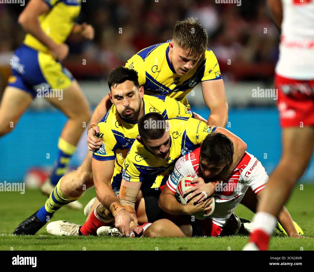 Luke Thomas of Warrington Wolves, Ryan Matterson of Warrington Wolves ...