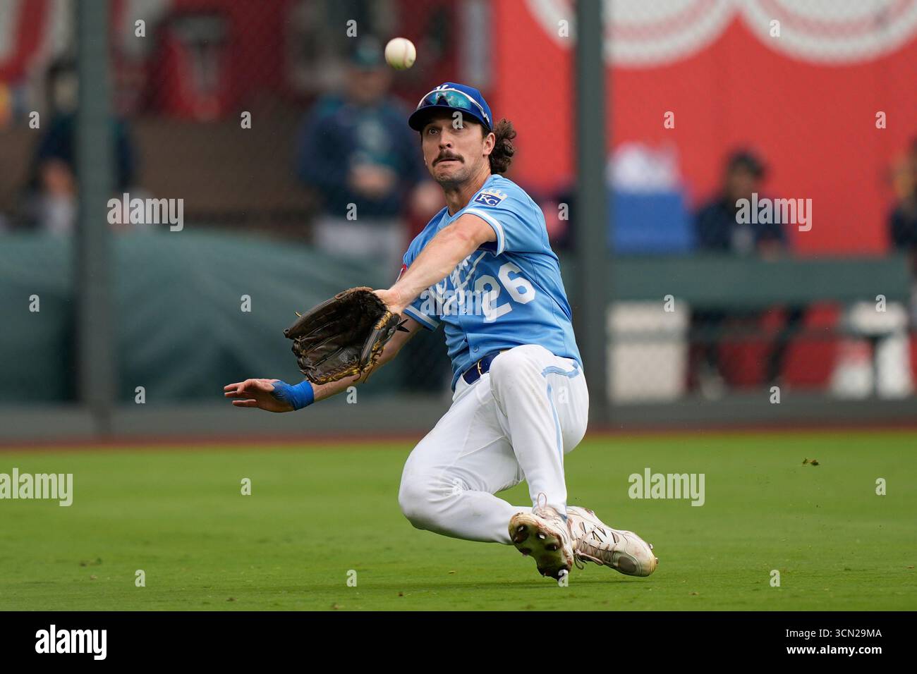 Kansas City Royals second baseman Adam Frazier catches a fly ball for ...