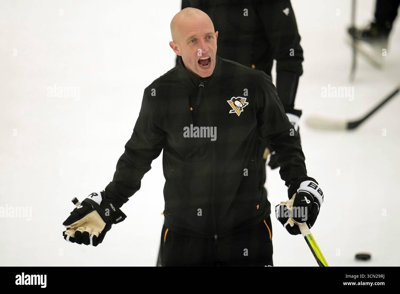 Pittsburgh Penguins head coach Dan Muse runs the NHL hockey team's ...