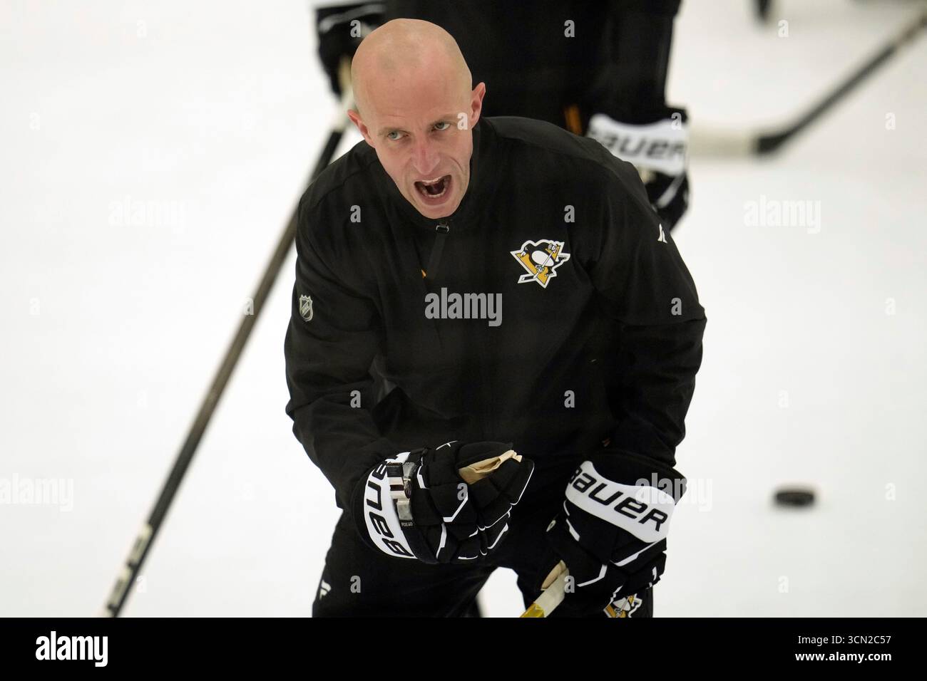Pittsburgh Penguins head coach Dan Muse runs the NHL hockey team's ...