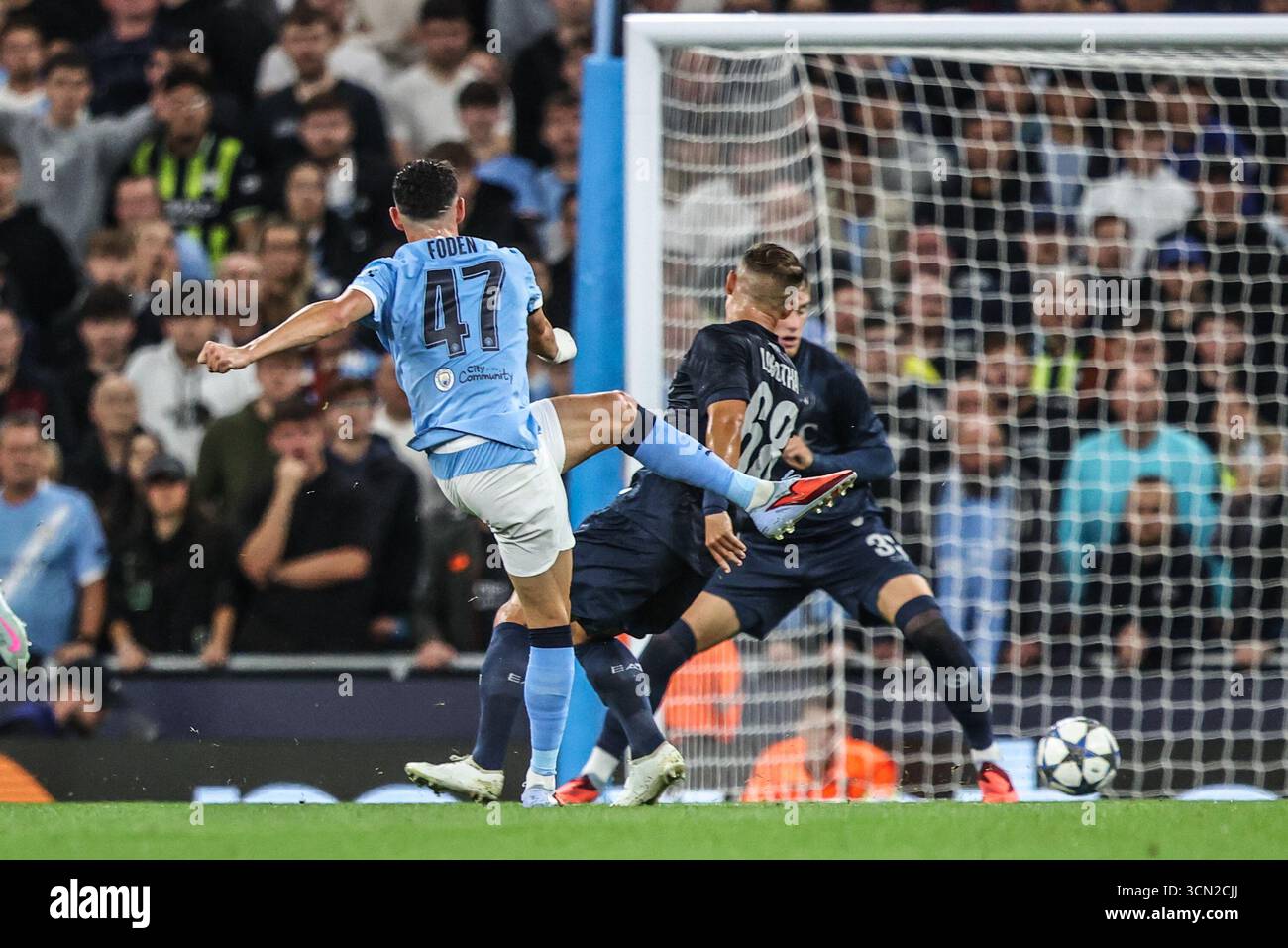 Phil Foden of Manchester City takes a shot on goal during the UEFA ...