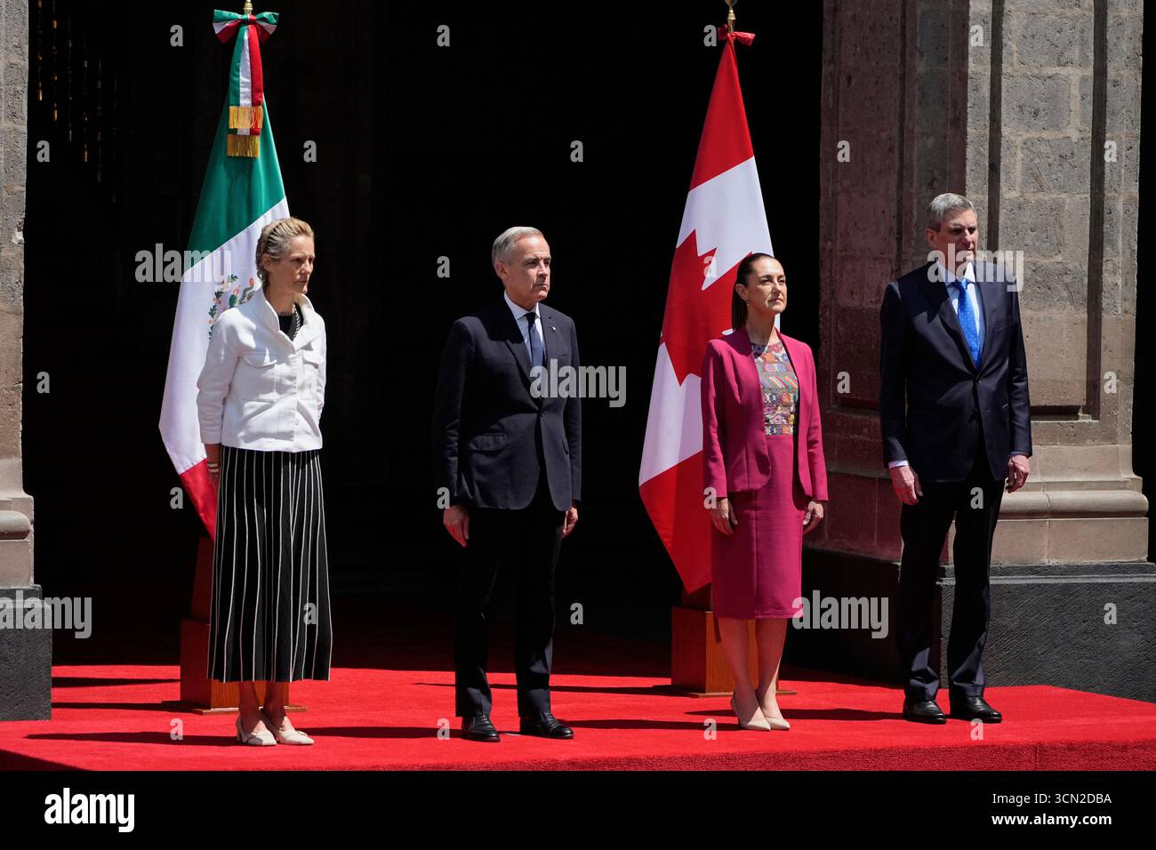 Canada's Prime Minister Mark Carney, second from left, and Mexico's ...