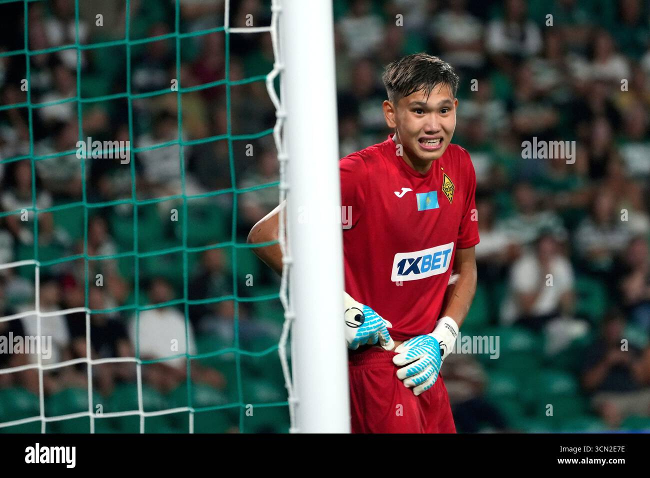 Kairat's 18-year-old goalkeeper Sherhan Kalmurza looks on during the ...
