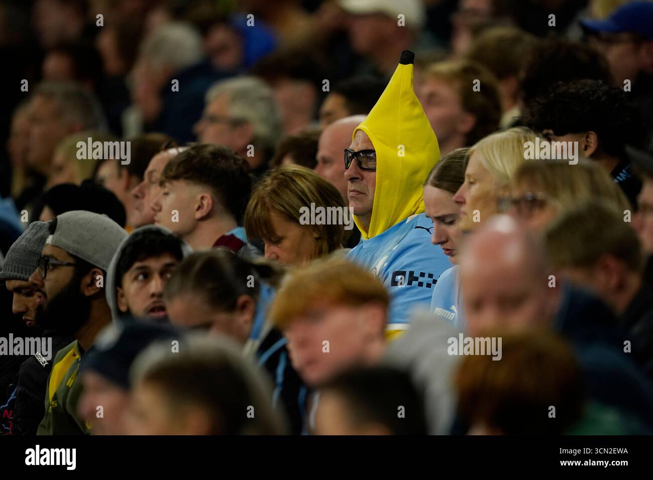 Manchester City's fan watches the Champions League opening phase soccer ...