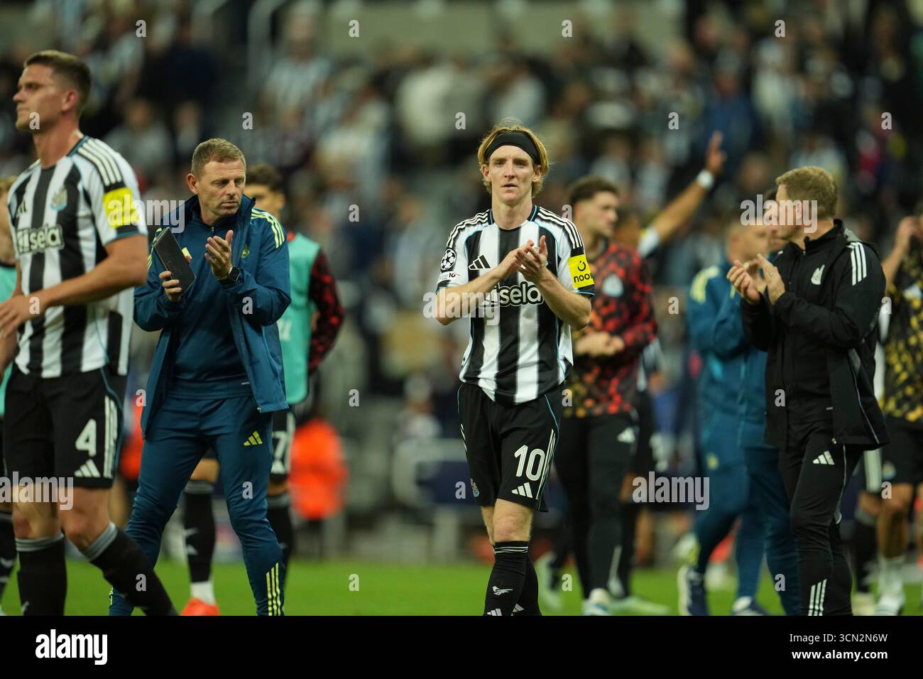Newcastle's Anthony Gordon claps hands after the end of the Champions ...