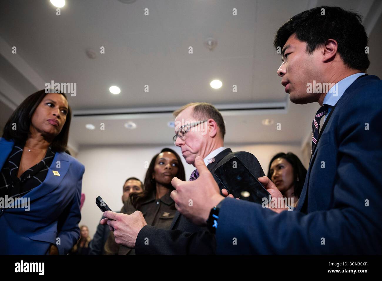 POLITICO reporter Nicholas Wu, at right, questions District of Columbia ...