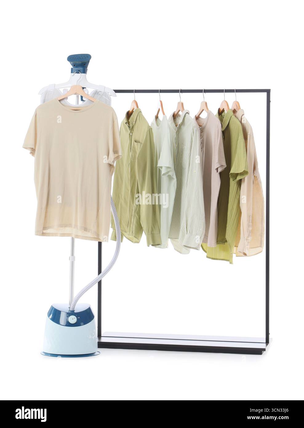Modern steamer and rack with clothes on white background Stock Photo ...