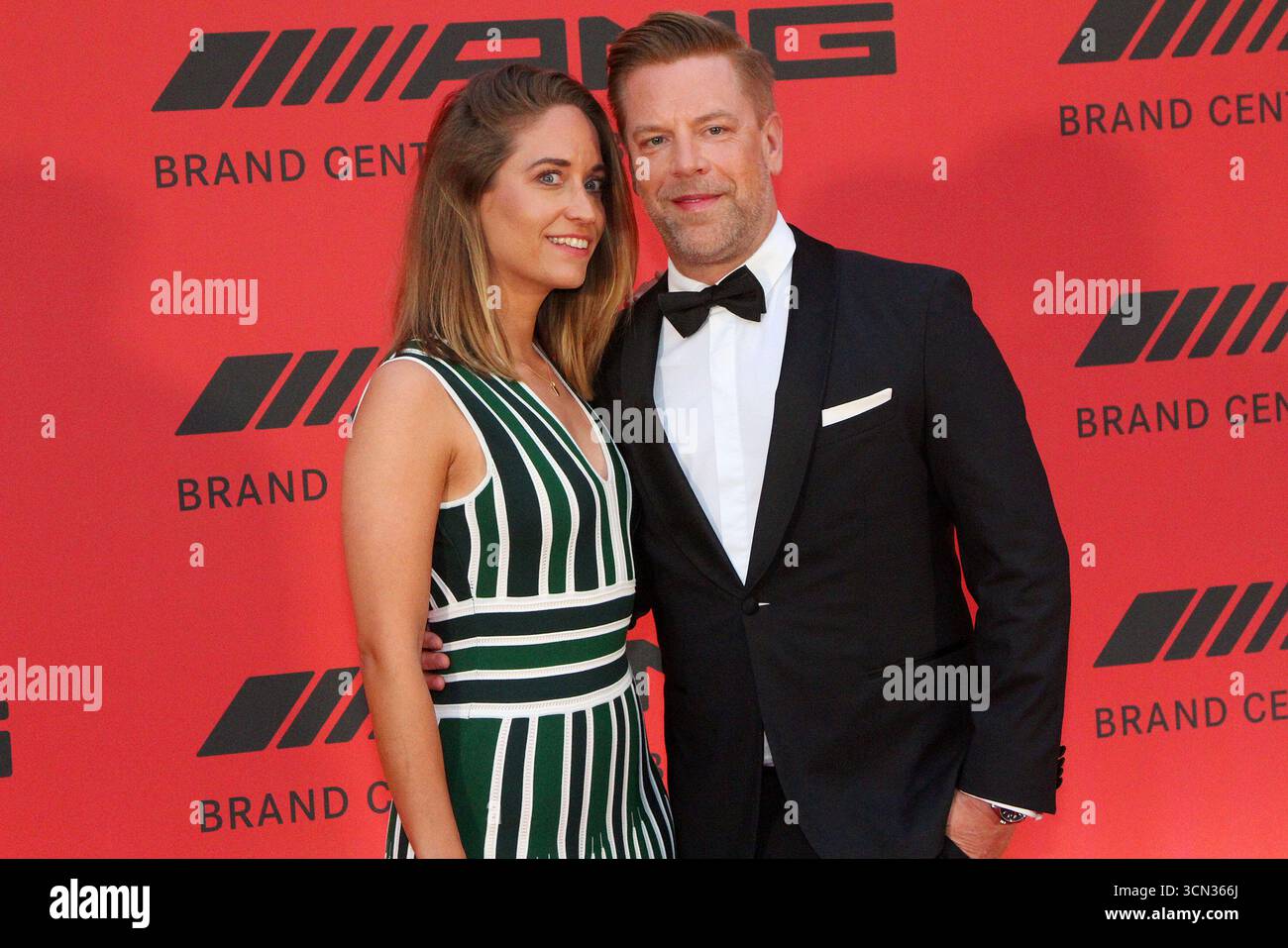 Tom Gaebel and Saskia Runge attend the Grand Opening of Mercedes AMG ...
