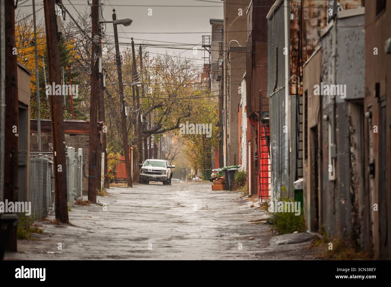 Rainy autumn day on a dilapidated North American residential alley in ...