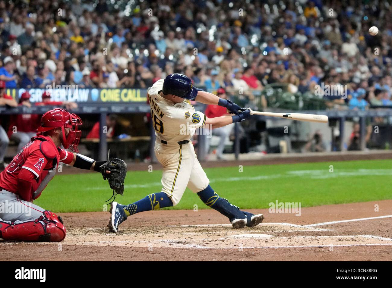 Milwaukee Brewers' Andrew Vaughn hits a double during the fourth inning ...