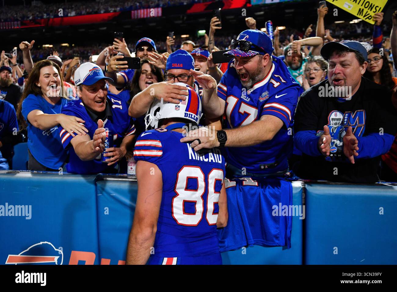 Buffalo Bills tight end Dalton Kincaid (86) celebrates with fans after ...