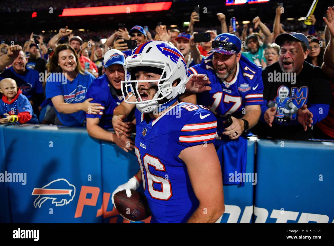 Buffalo Bills tight end Dalton Kincaid (86) celebrates with fans after ...