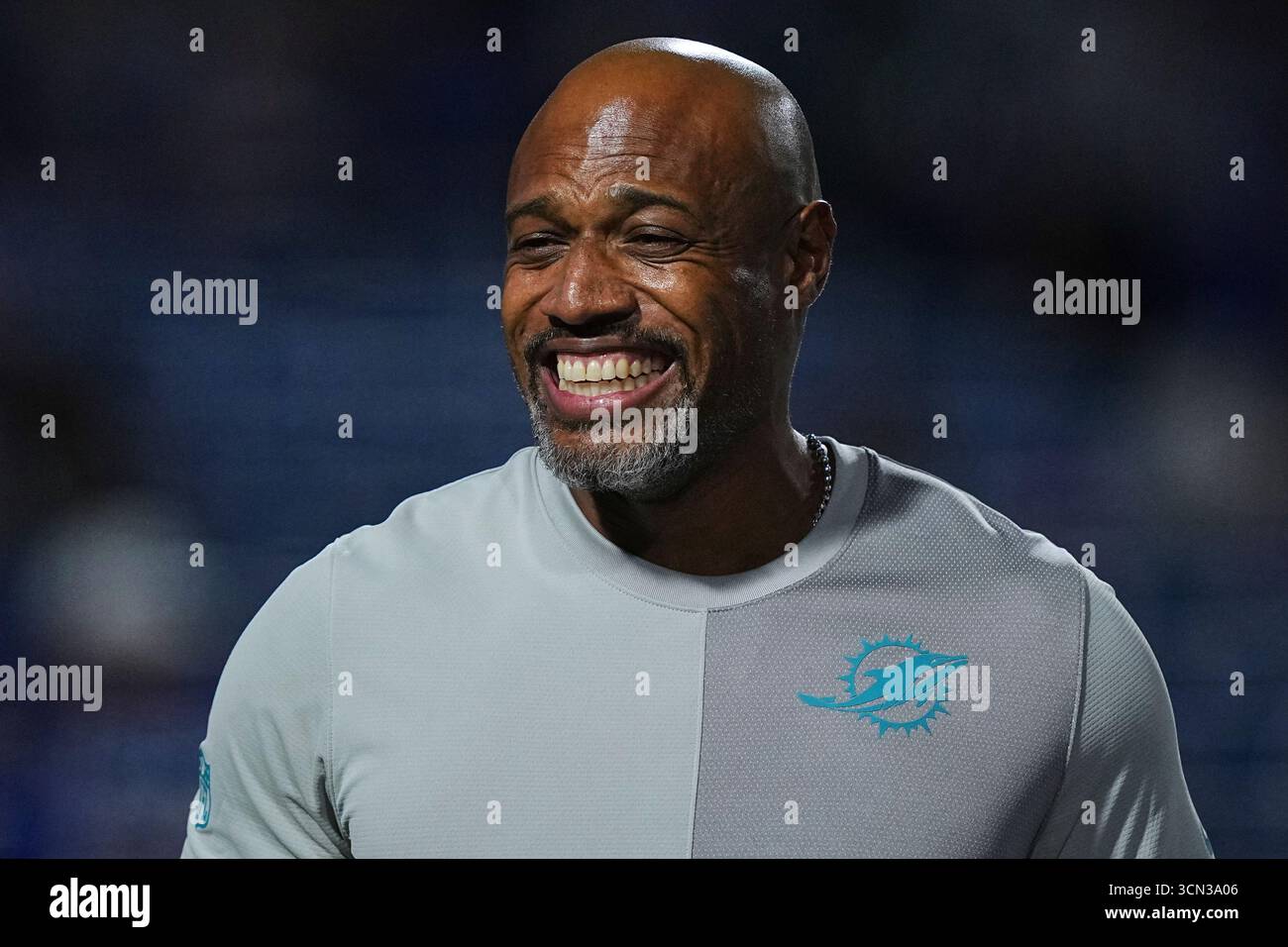 Miami Dolphins defensive coordinator Anthony Weaver walks on the field ...