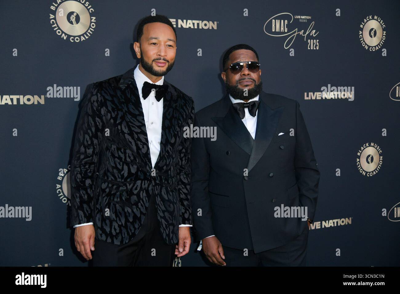 John Legend, left, and BMAC CEO Willie "Prophet" Sitggers arrive at the ...