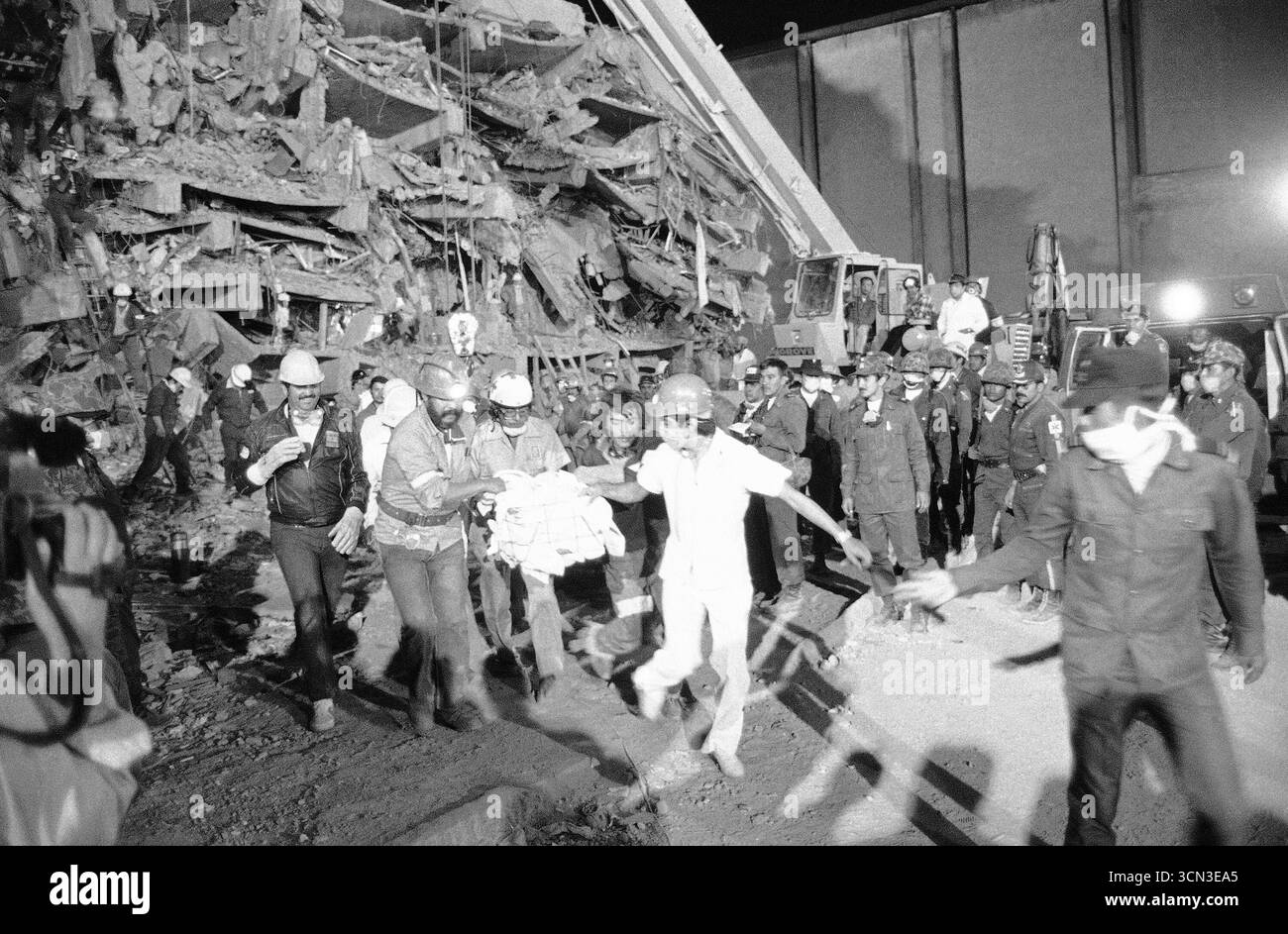 FILE - Emergency workers carry hospital patient Rubalcada Pena after ...