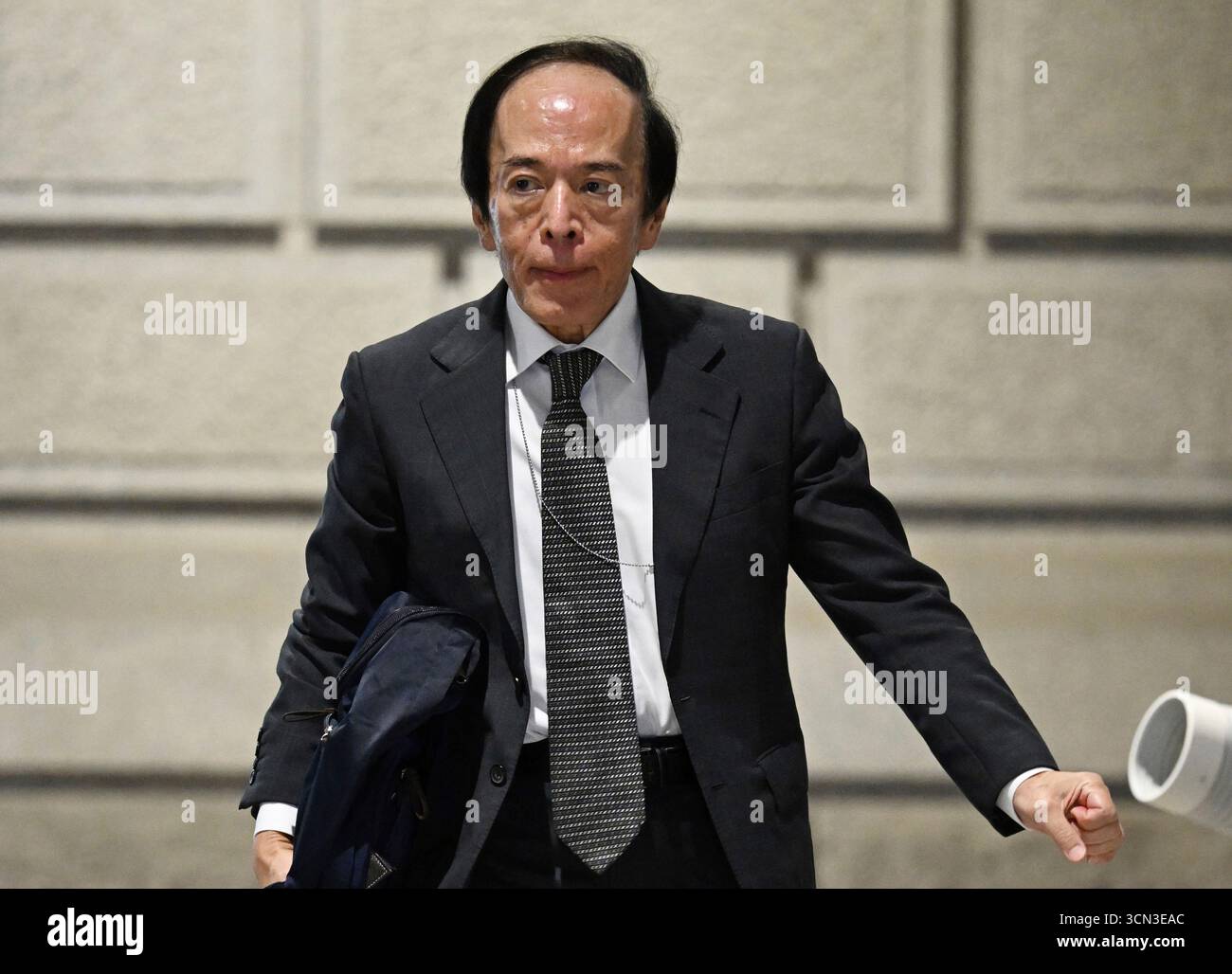 Bank of Japan Governor (BOJ) Kazuo Ueda enters the Bank of Japan ...