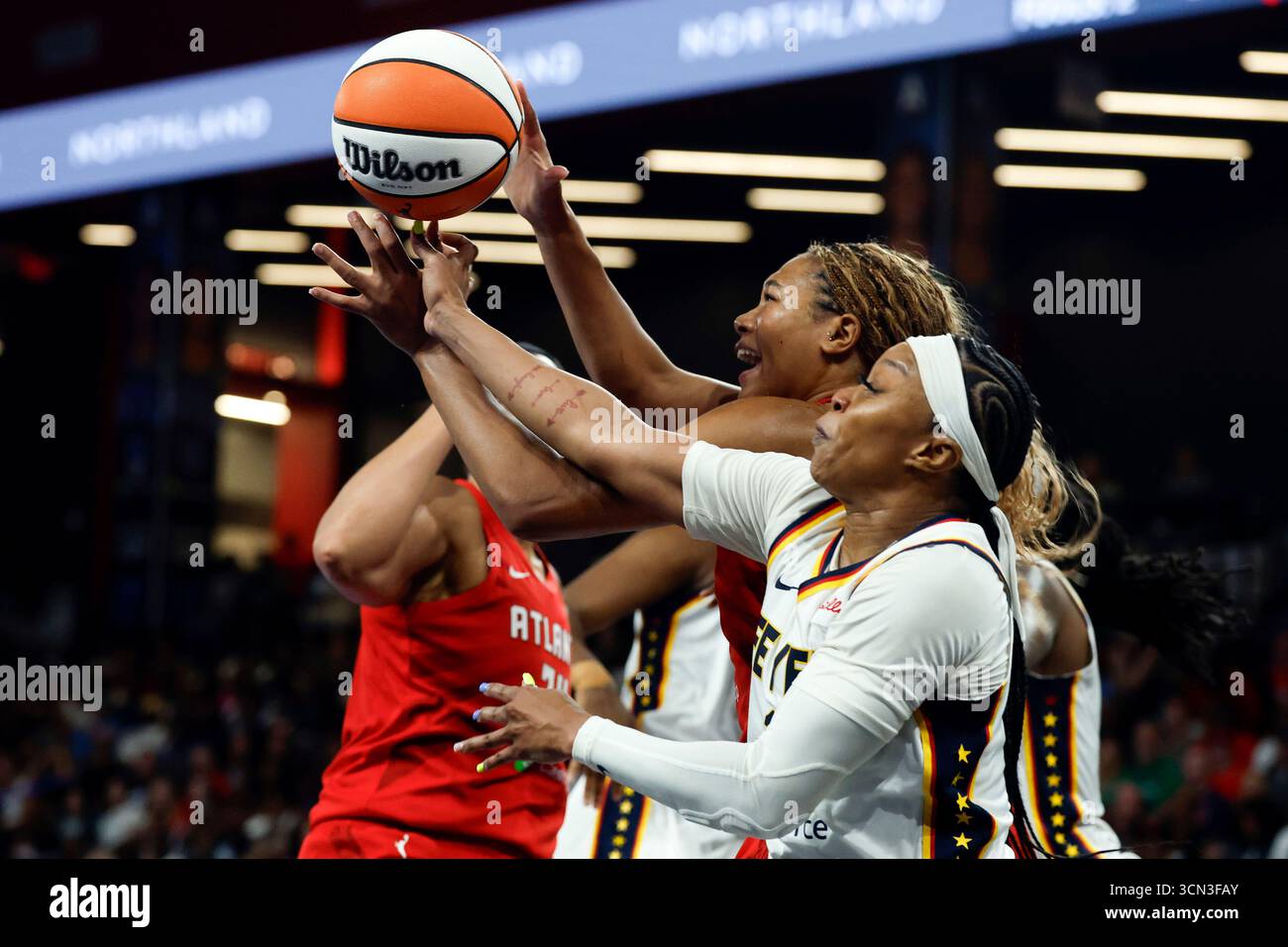 Indiana Fever guard Odyssey Sims, front right, and Atlanta Dream ...