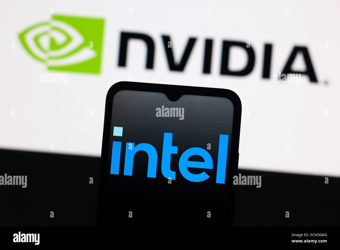 In this photo illustration, the Intel logo is seen displayed on a ...