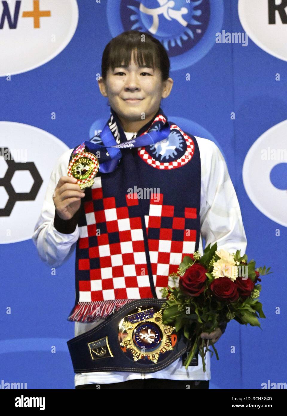 Haruna Murayama of Japan poses after winning gold in the women's 53 ...