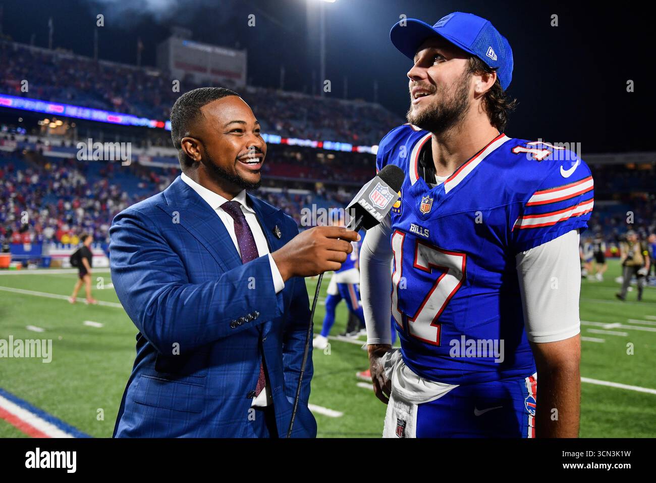 Buffalo Bills quarterback Josh Allen, right, is interviewed by NFL ...