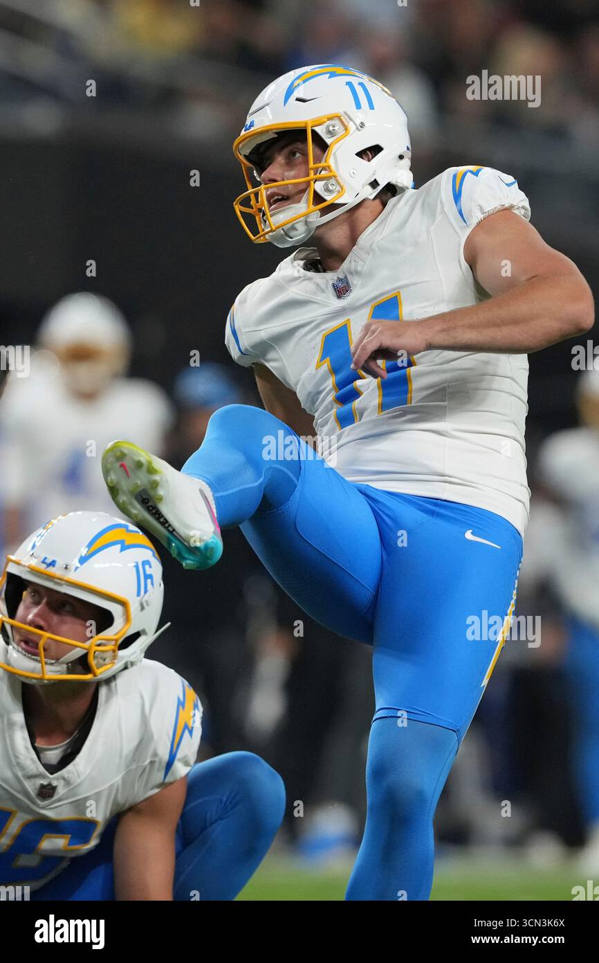 Los Angeles Chargers kicker Cameron Dicker (11) kicks the ball against ...