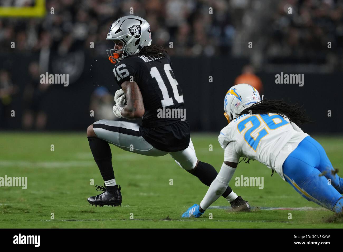 Las Vegas Raiders wide receiver Jakobi Meyers (16) runs the ball against the Los Angeles ...