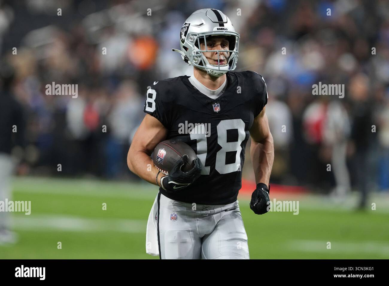 Las Vegas Raiders wide receiver Jack Bech (18) warms up before an NFL ...