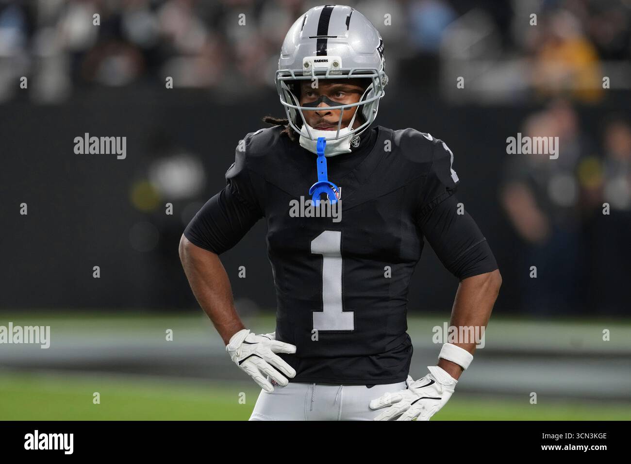Las Vegas Raiders wide receiver Tre Tucker (1) warms up before an NFL ...