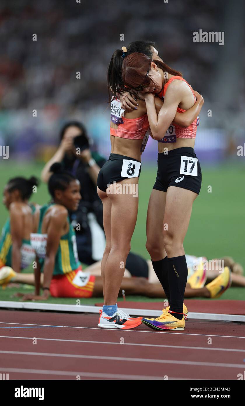 Japanese Yuma YAMAMOTO (R) and Nozomi TANAKA congratulate after ...