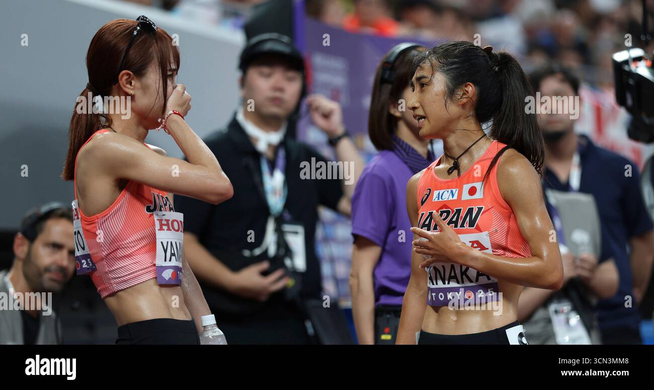 Japanese Yuma YAMAMOTO (L) and Nozomi TANAKA congratulate after ...