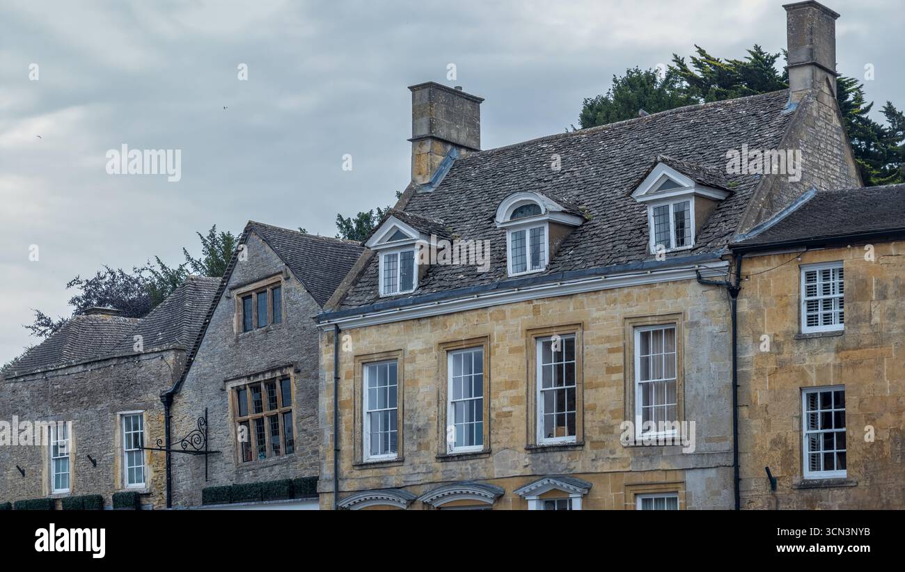 Charming Old English Stone Houses with Gable Roofs Stock Photo - Alamy