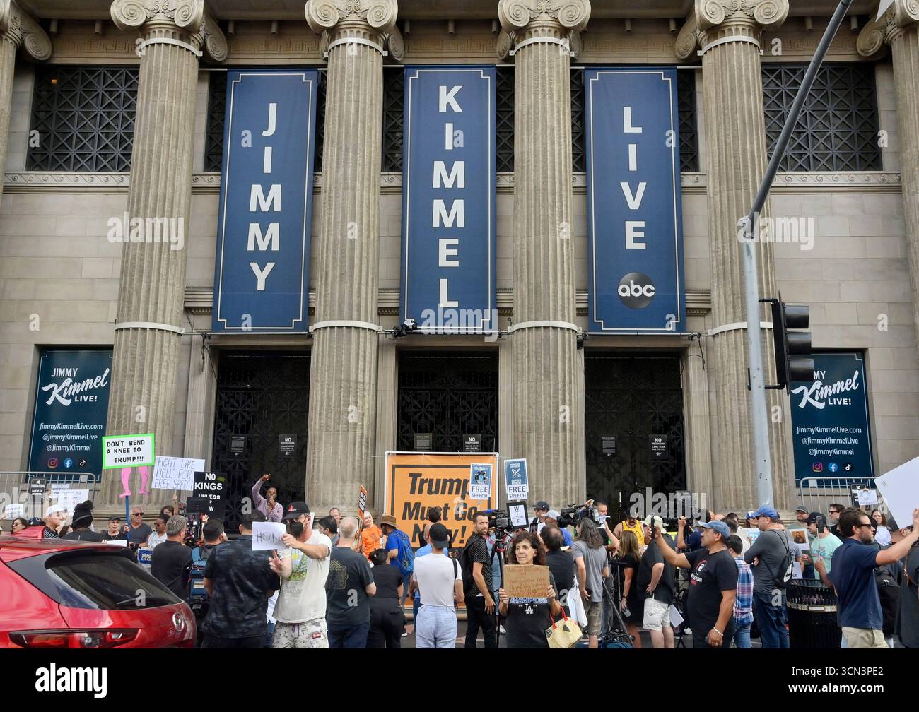 Activists protest outside the El Capitan Entertainment Center on ...