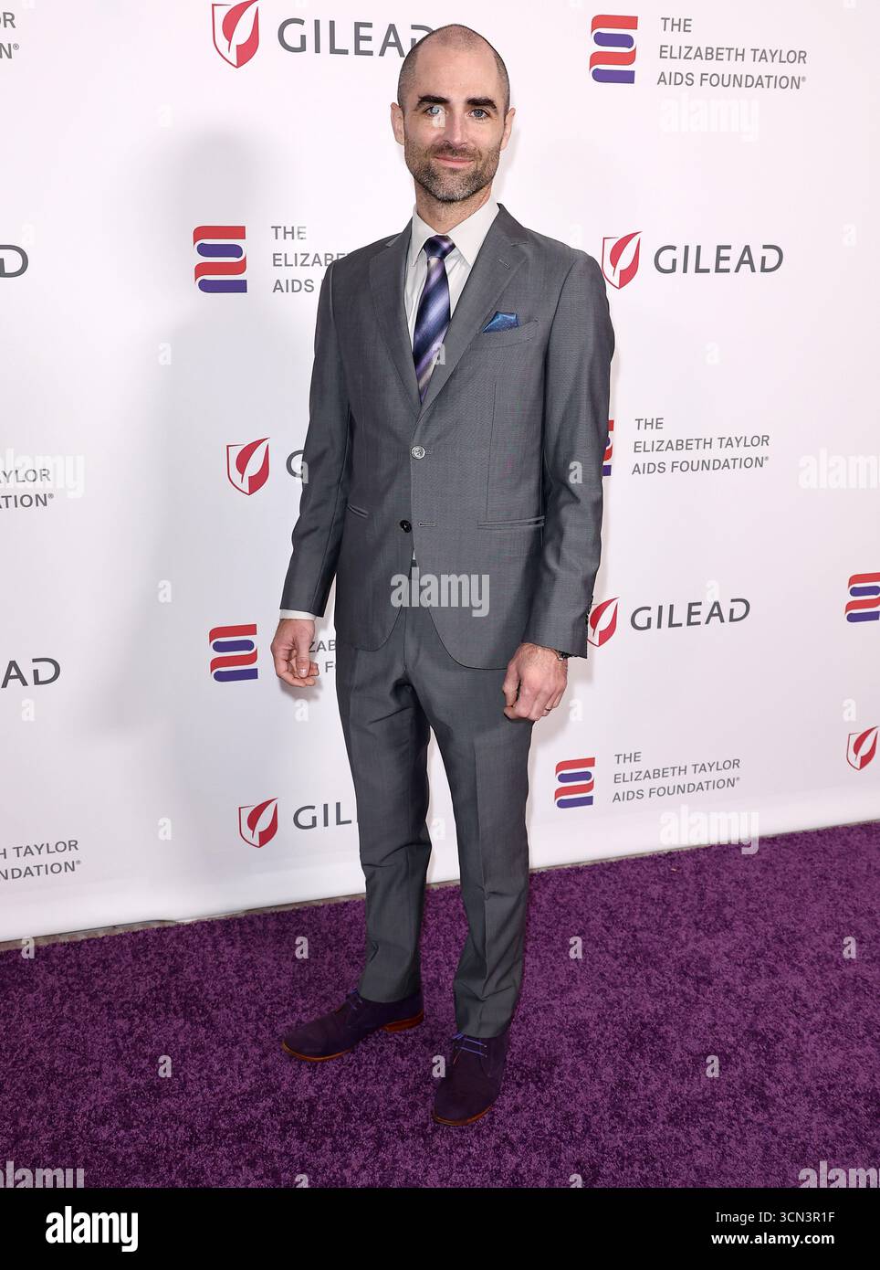 Quinn Tivey arrives at The Elizabeth Taylor Night of Compassion held at ...