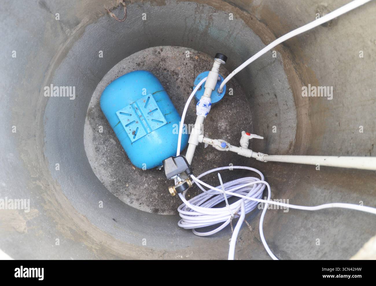 New borehole with water supply system. Water borehole, hydraulic ...