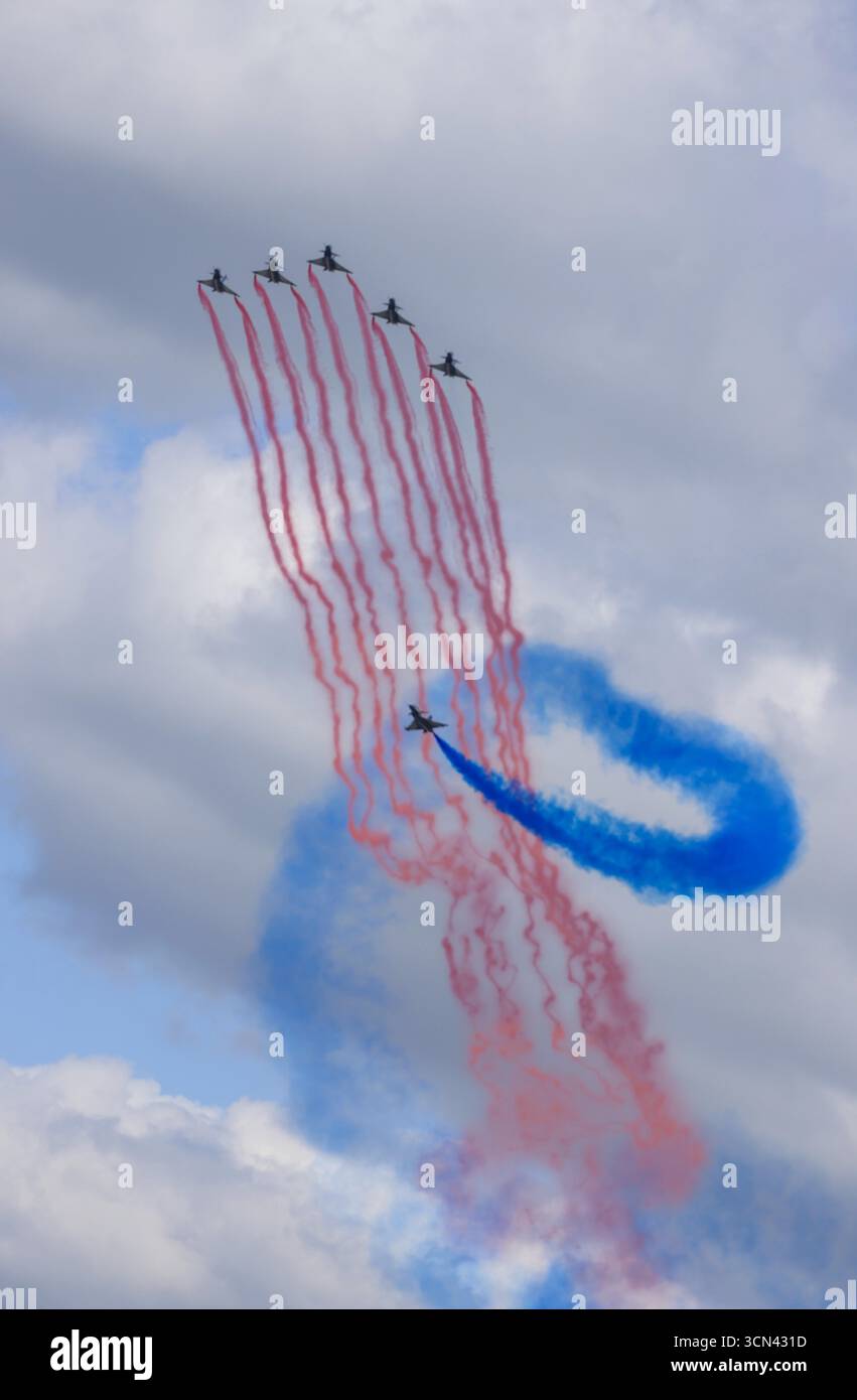 Visitors watch a flight demonstration during a preview of the 2025 ...