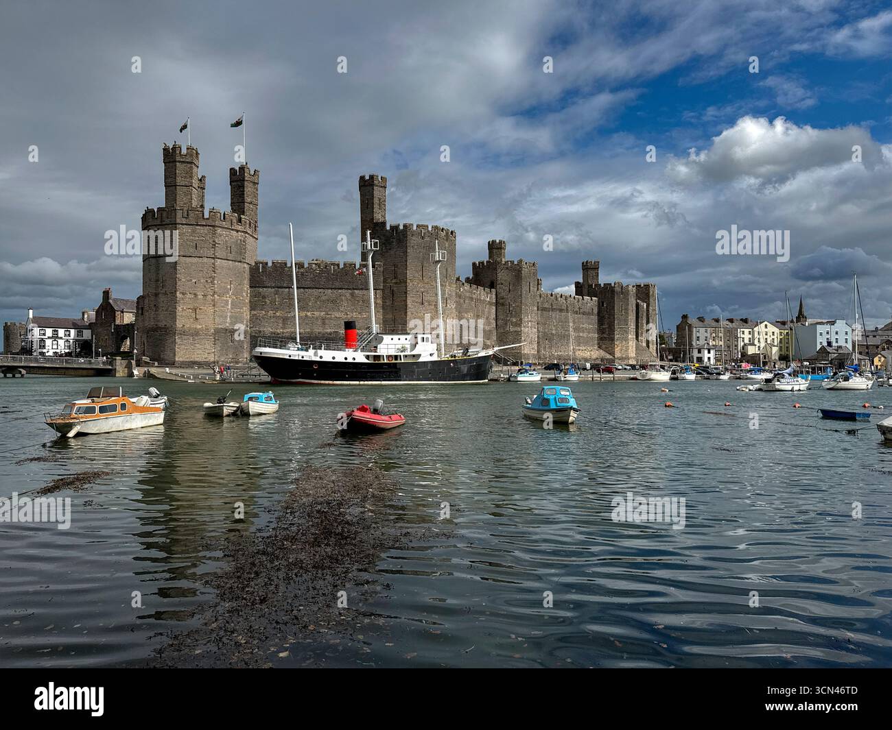 Caernarfon Castle on the north Wales coast. A medieval fortress that ...