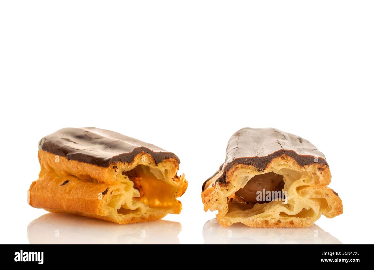 Chocolate sweet eclair, macro, isolated on white background Stock Photo ...