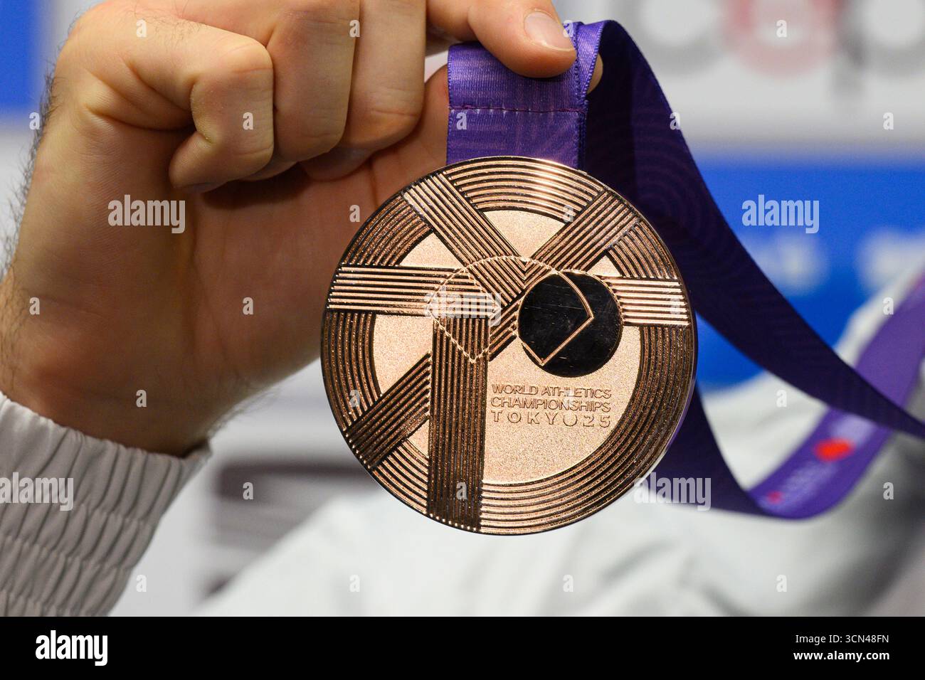 Czech high jumper Jan Stefela shows his bronze medal during a meeting ...