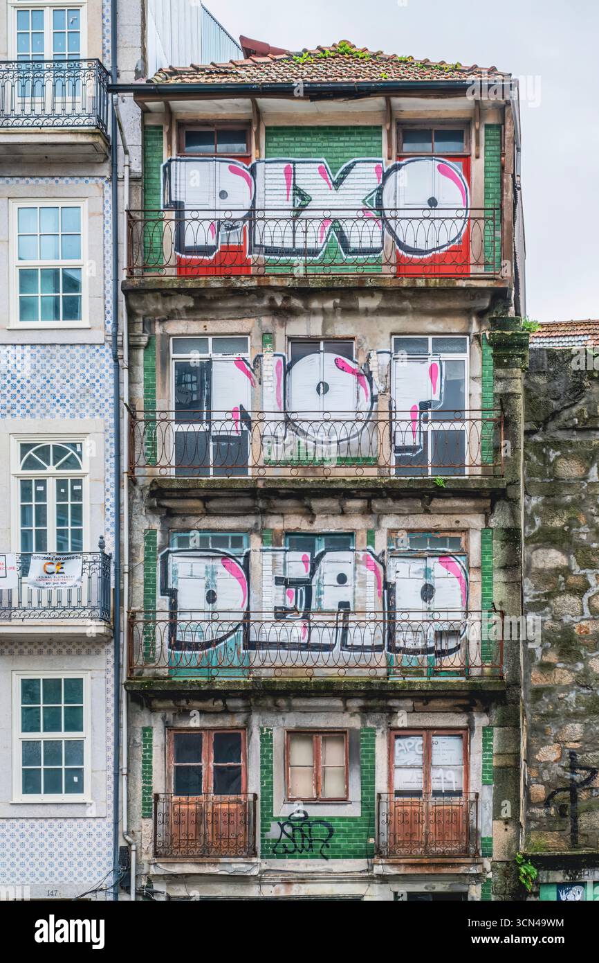 Colorful Street Art Graffiti On Historic Building Facade In Porto ...